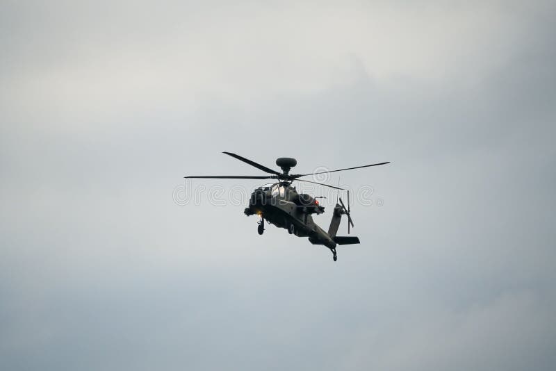 Dark Grey Army Attack Helicopter in Flight during the Daytime Stock ...