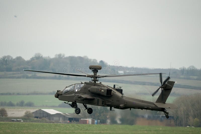Dark Grey Army Attack Helicopter in Flight during the Daytime Stock ...