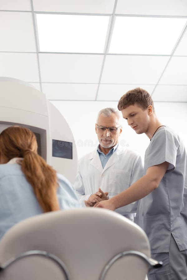 Doctor Helping Senior Patient With Drop Counter Stock Image - Image of ...