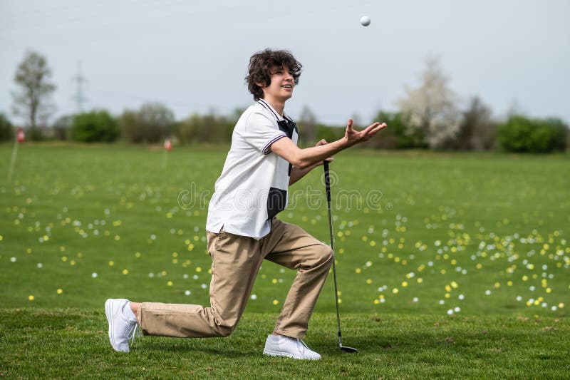 Dark-haired Young Guy Playing Gold and Looking Excited Stock Image ...