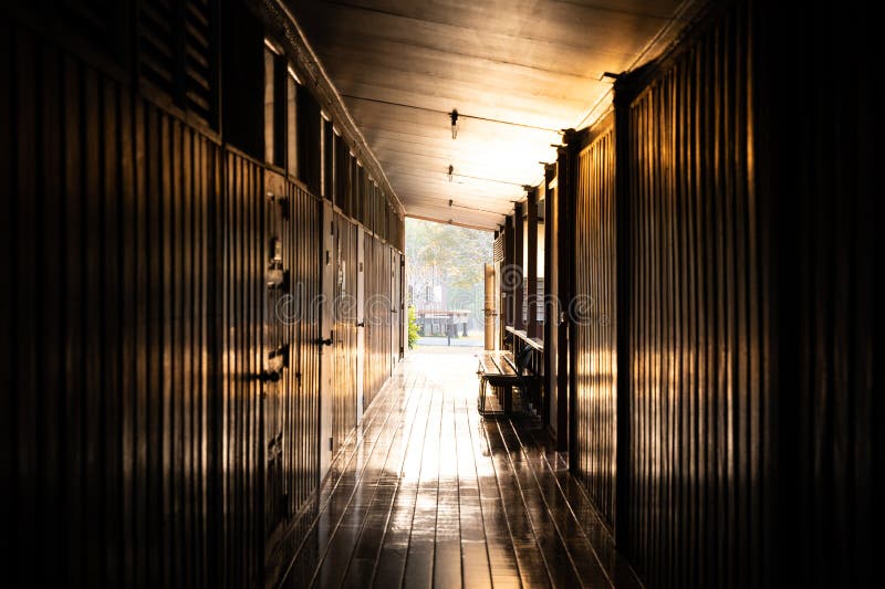 Dark Hallway Inside Wooden Residence Building with Bright Sunlight at ...