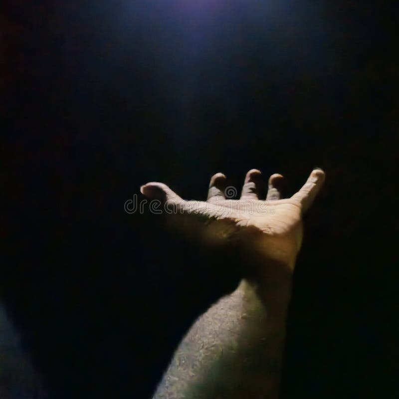 Dark of hand lighting stock image. Image of place, hand - 249217907
