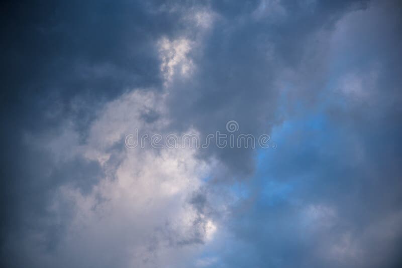 Dark Heavy Clouds after the Rain Has Formed a Divine Gap of Light and ...