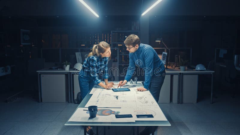 In the Dark Industrial Design Engineering Facility Male and Female ...