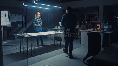 In the Dark Industrial Design Engineering Facility Male and Female ...