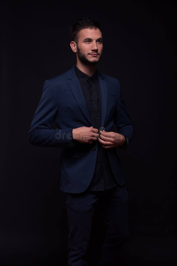Dark, Low Light Model Buttoning Jacket Suit Stock Image - Image of ...