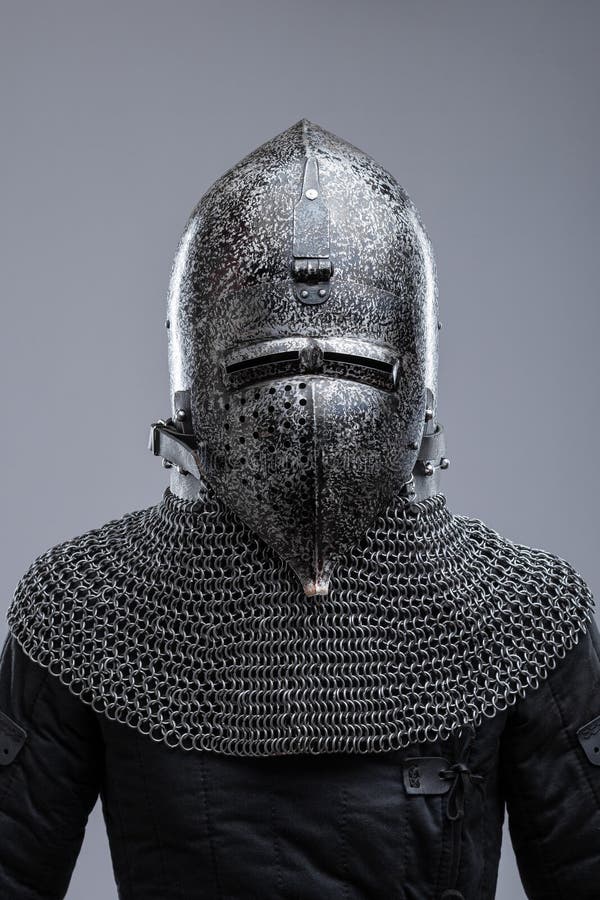 Dark Metal Helmet with Pointed Top and Faceplate Stock Image - Image of ...