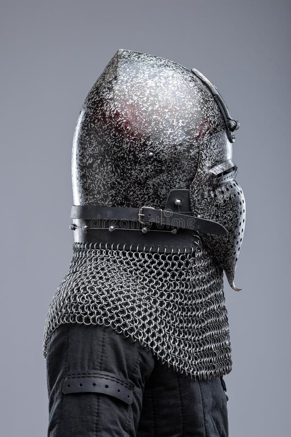 Dark Metal Helmet with Pointed Top and Faceplate. Stock Image - Image ...