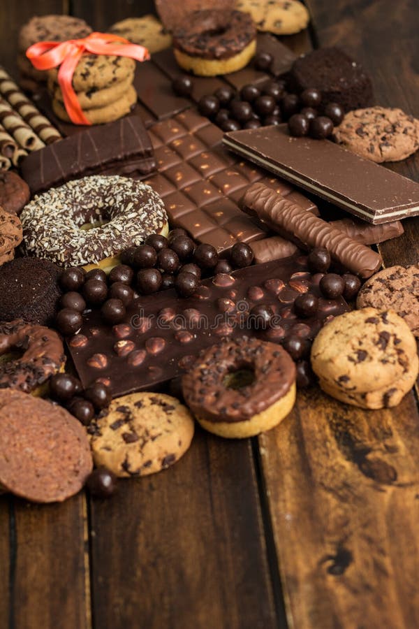 Chocolates and Biscuits Assortment Background Stock Photo - Image of ...