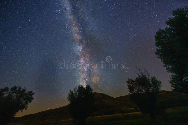 Dark Night Sky with Many Stars Above a Field Stock Photo - Image of ...