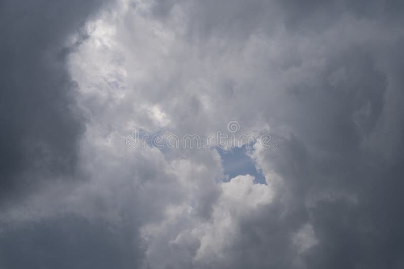Heavy, Brooding Storm Clouds Gather in the Sky, Creating a Dramatic and ...