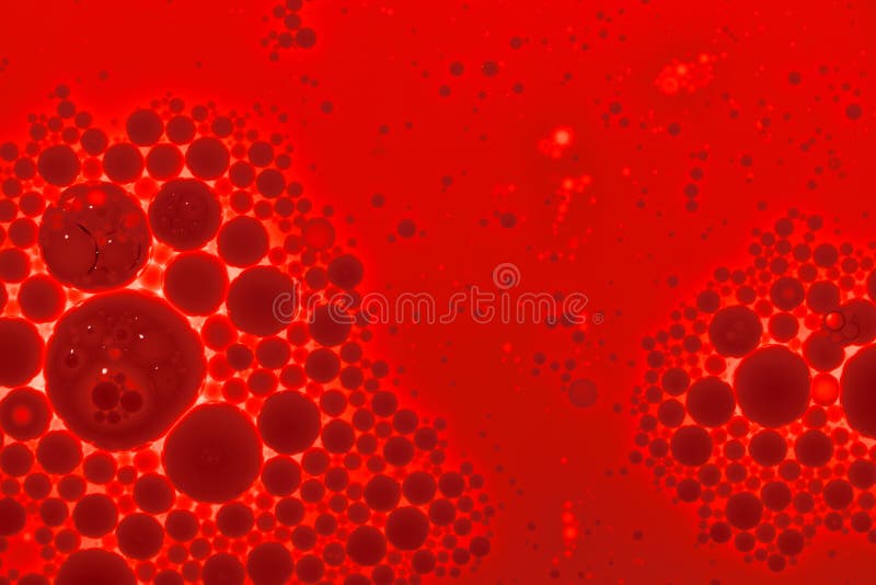 Dark Opaque Bubbles on a Red Background. Stock Image - Image of liquid ...