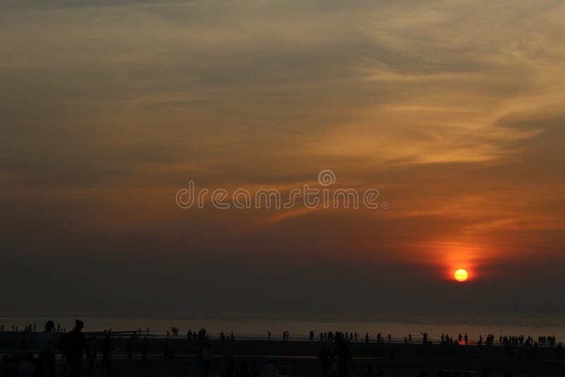 Dark orange sunset stock photo. Image of ocean, sunset - 132920420