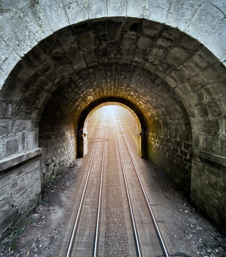 Dark Passageway of Roughly Hewn Stones with a Round Arch through Which ...