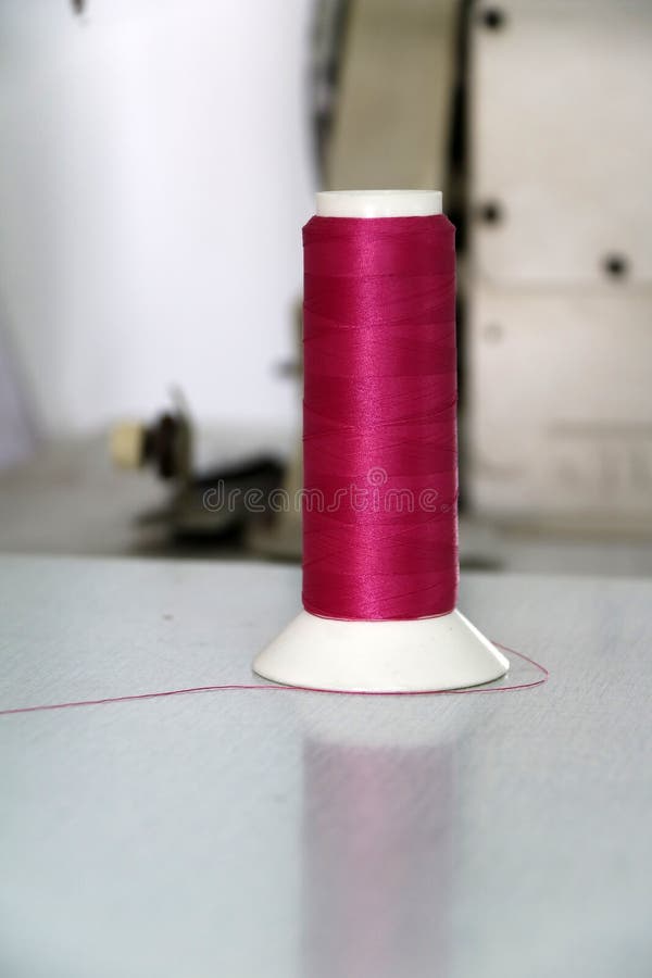 Dark Pink Thread in the Thread Roll Put Vertical on the Sewing Machine ...