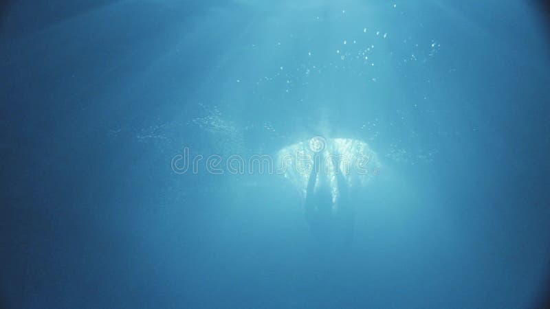 In the Dark Pool, with Some Lights Falls into the Water a Man Falling ...