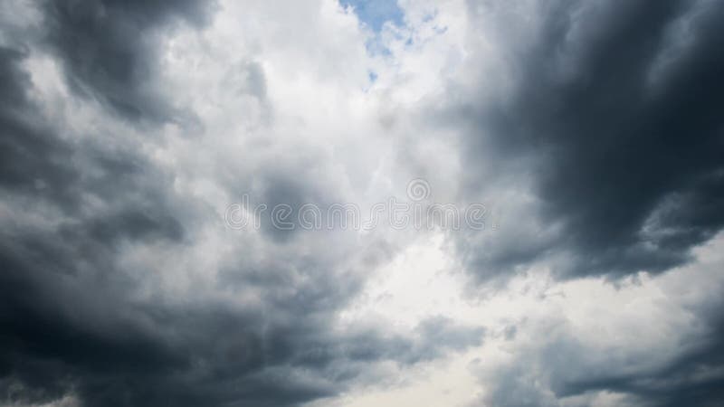 Dark Rain Clouds Move Across the Sky, Sun Darkens in Time Lapse Mode ...