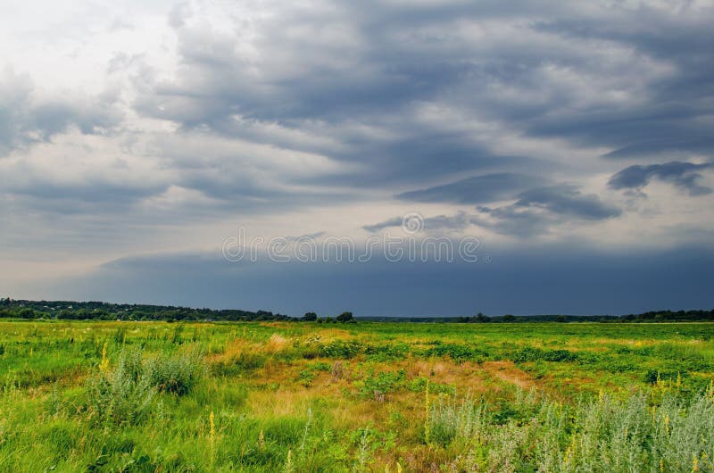 Dark Rain Storm Clouds Over the Field Stock Photo - Image of cloudscape ...