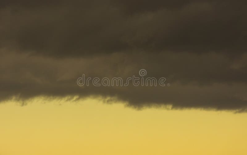 Dark Rainclouds and Yellow Color at the Sky during Storm Stock Image ...