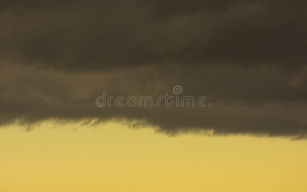 Dark Rainclouds and Yellow Color at the Sky during Storm Stock Image ...