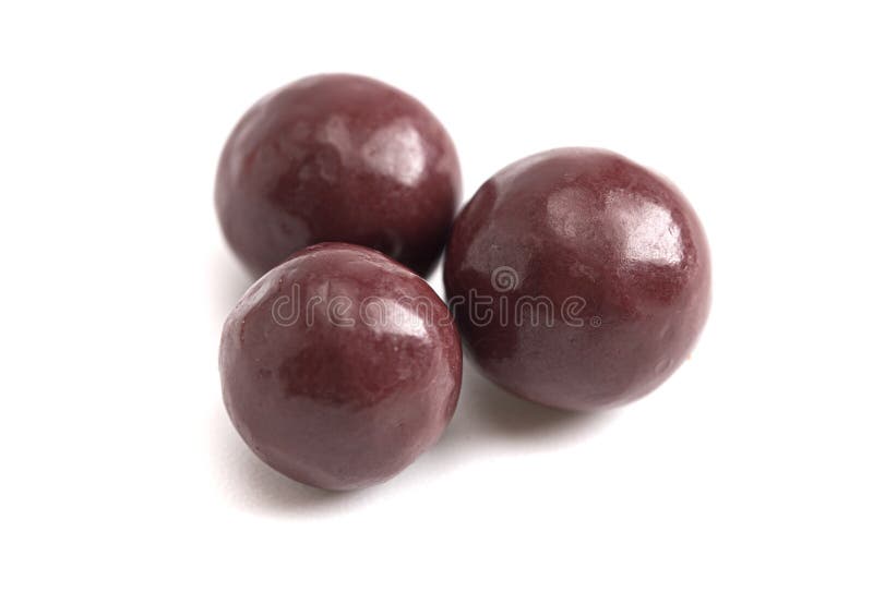 Dark Red Coated Chocolate Covered Dried Fruit on a White Background ...