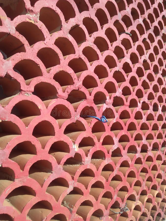 Dark red hole wall pattern stock photo. Image of dark - 254022834