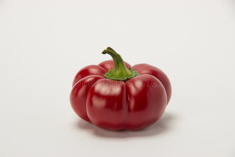 Dark Red Large Pepper on a White Background Stock Image - Image of ...