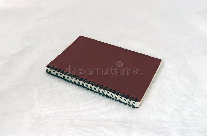 Dark Red Note Book and the Black Ring of Spine Book. Stock Image ...