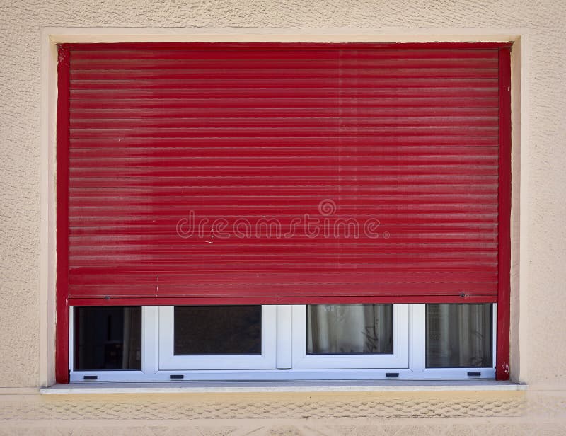 Dark Red Rolling Shutters and White Frame Window on Beige Wall, Stock ...