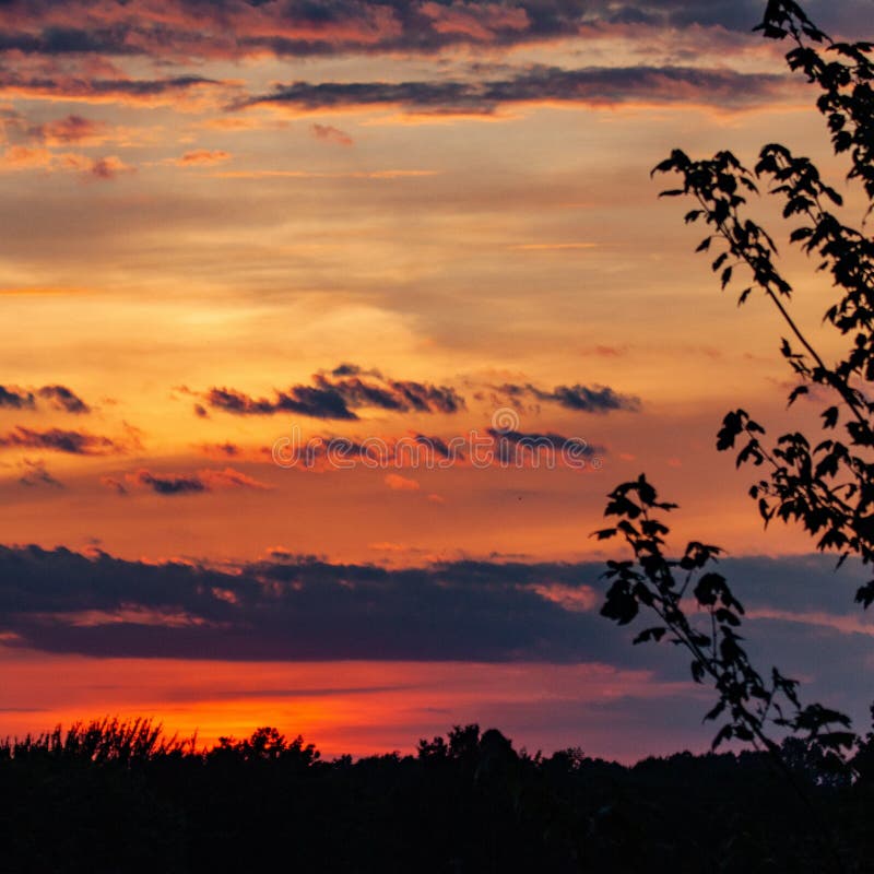 Dark Red Sunset with Purple Clouds Stock Photo - Image of sunset, dark ...