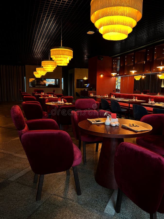 Dark Restaurant Interior with Lights and Plants Stock Photo - Image of ...