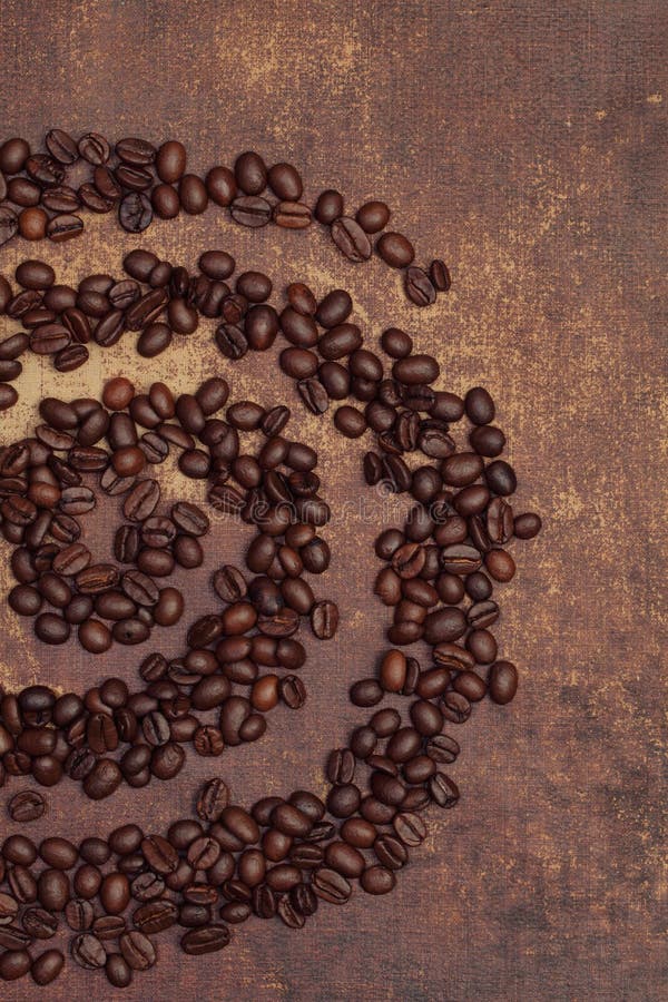 Dark Roasted Coffee Beans Arranged in a Spiral Formation Stock Image ...