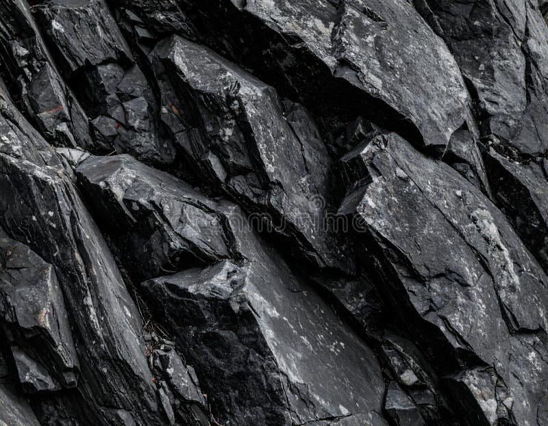Dark Rock Face Forming a Natural Background with Diagonal Lines Stock ...