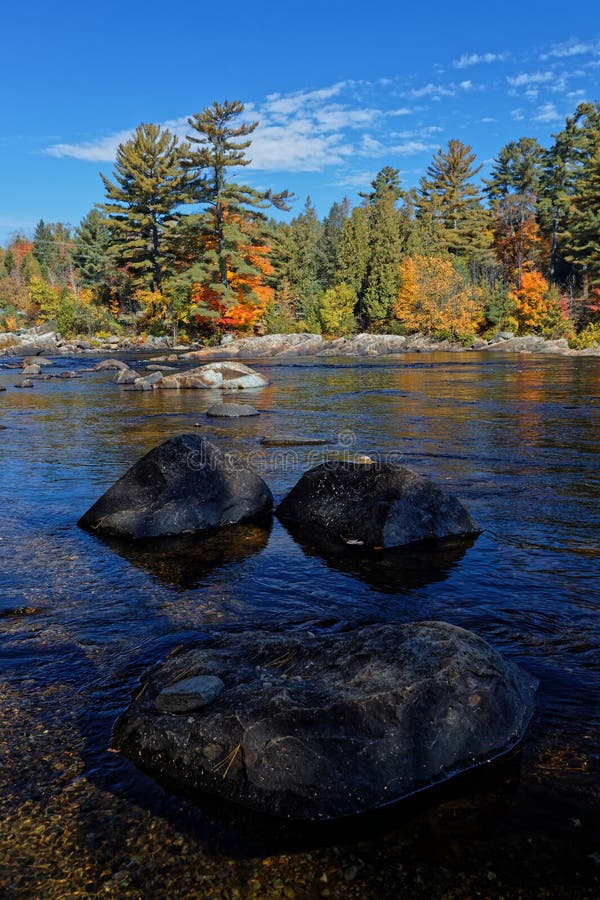 Dark Rocks on the River, Parc Des Cascades Stock Image - Image of ...