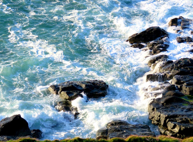 Dark Rocks Washed in the Surf Stock Image - Image of surf, seaside ...