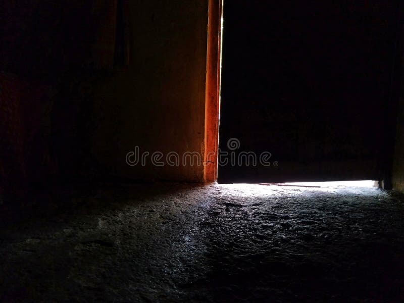 Dark Room with Slightly Opened Door Stock Image - Image of dark ...