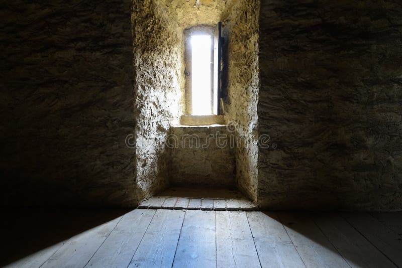 Dark Room with Stone Walls Window and Wooden Staircase Stock Photo ...
