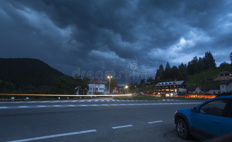 Dark Scene of Intersection and Rain Clouds. Stock Image - Image of ...