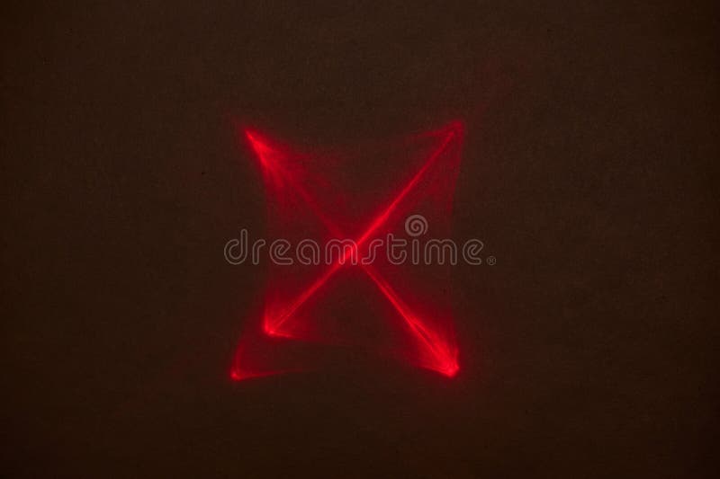 On a Dark, Semi-blurred Background, a Crossed Red Beam of Light Stock ...