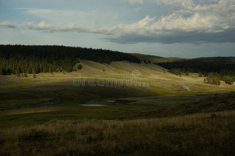 Dark Shadows Pass Over Yellowstone River and Hayden Valley Stock Image ...