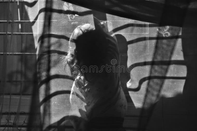Dark Silhouette of a Child Behind a Wall Stock Image - Image of ...