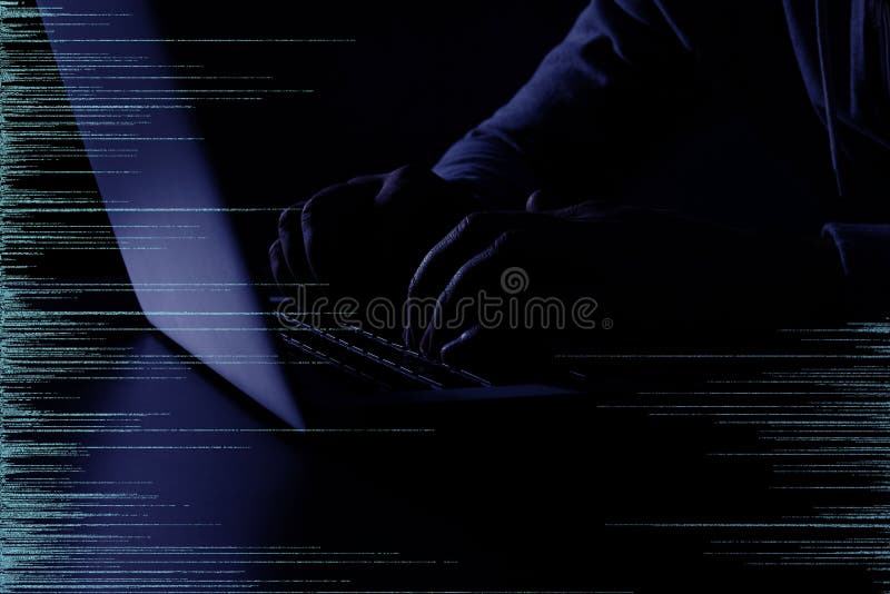 Dark Silhouette of Cyber Criminal Hacking Computer Behind Digital ...