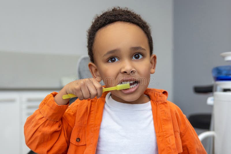 Dark-skinned Boy Brushing His Teeth Stock Image - Image of treatment ...
