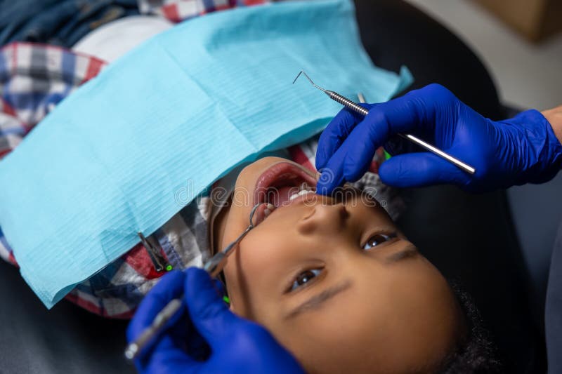 Dark-skinned Boy Looking Scared of Medical Tools Stock Photo - Image of ...