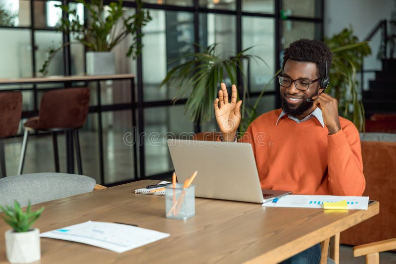 Dark-skinned Businessman Having a Call Online and Looking Involved ...