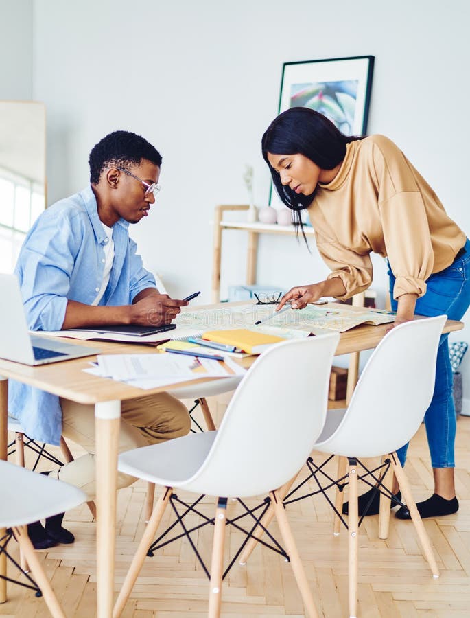 Dark Skinned Colleagues Talking To Each Other during Working Process at ...