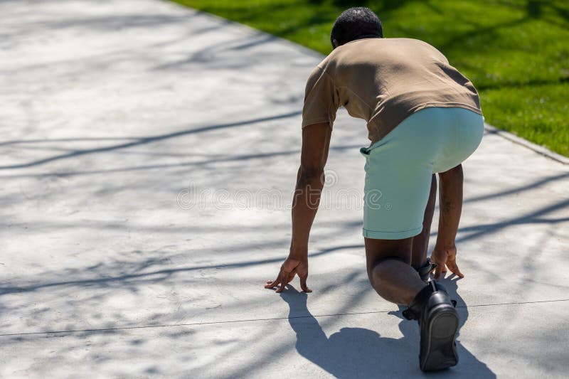 Dark-skinned Man Getting Ready To Strat His Run Stock Photo - Image of ...