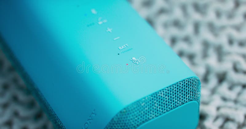 Dark-skinned Man Presses Song Mute Button on Music Speaker with Finger ...