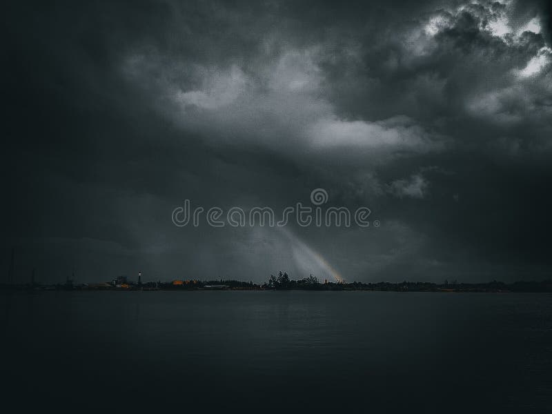The Dark Sky on a Big River Looks Scary Stock Photo - Image of looks ...