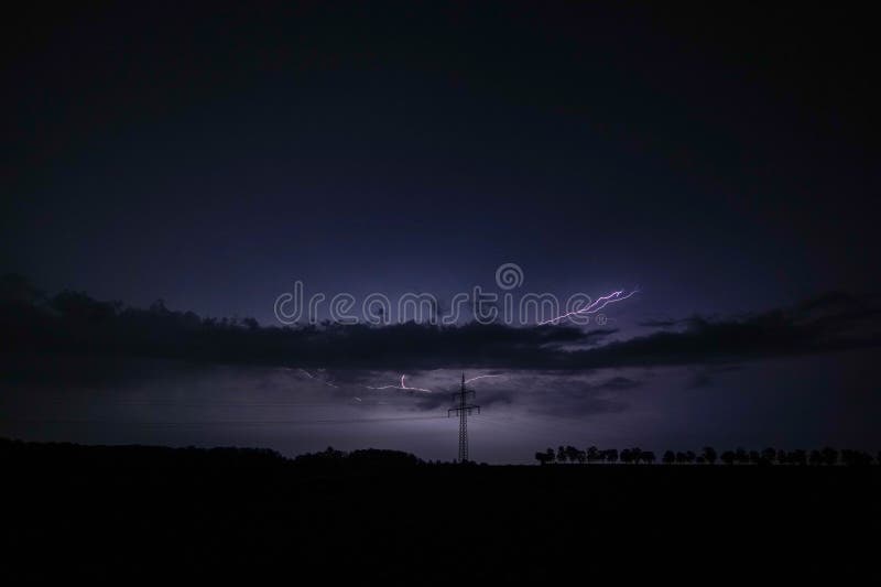 A Dark Sky with a Lightning Bolt in the Middle Stock Image - Image of ...